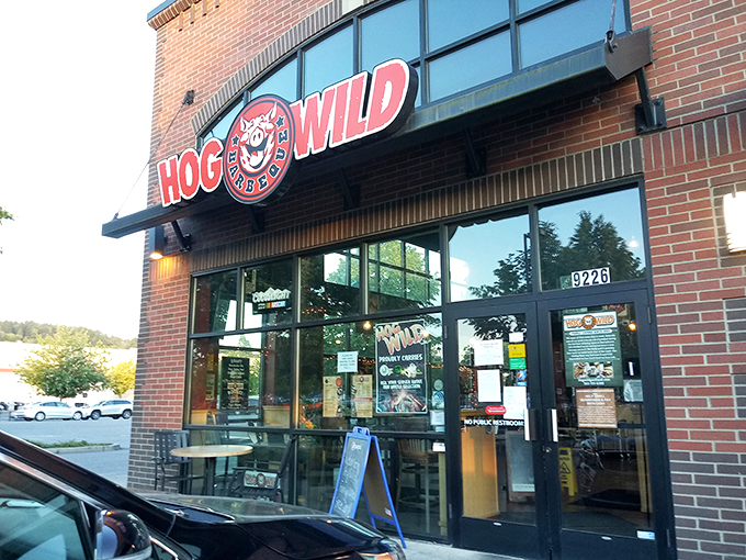 Welcome to BBQ paradise! Hog Wild's brick exterior might be unassuming, but inside lies a smoky wonderland that'll make your taste buds dance.