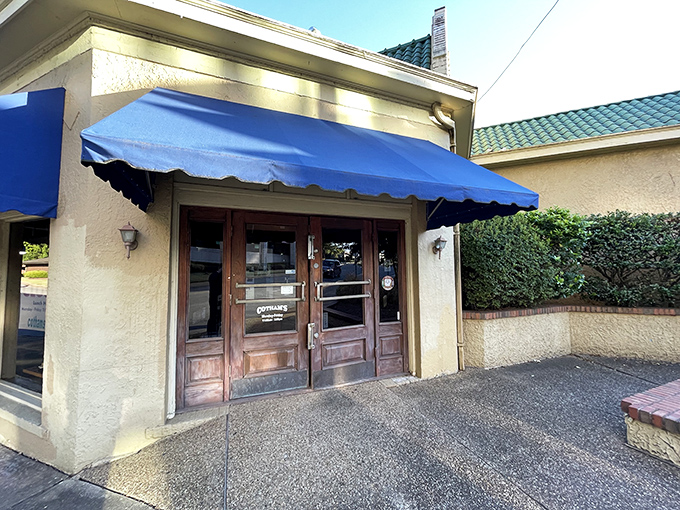 A blue awning and wooden doors? Don't be fooled - this unassuming exterior hides a treasure trove of culinary delights that'll make your taste buds sing!
