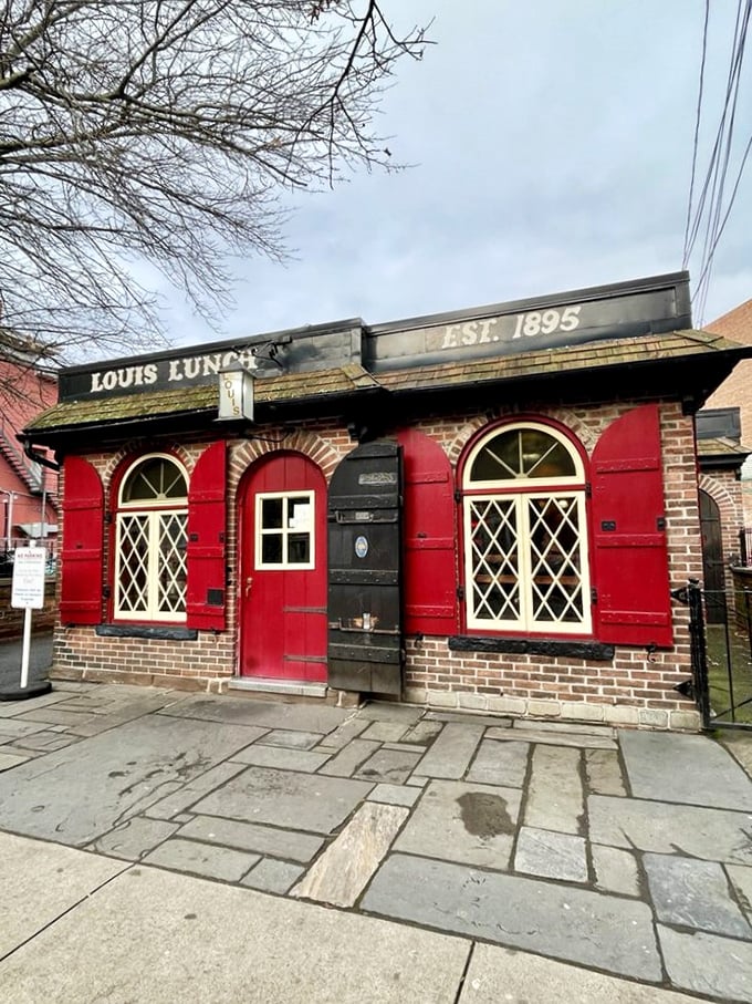 A little red brick building with a big burger legacy. Louis' Lunch stands proud, serving up history and flavor since 1895.