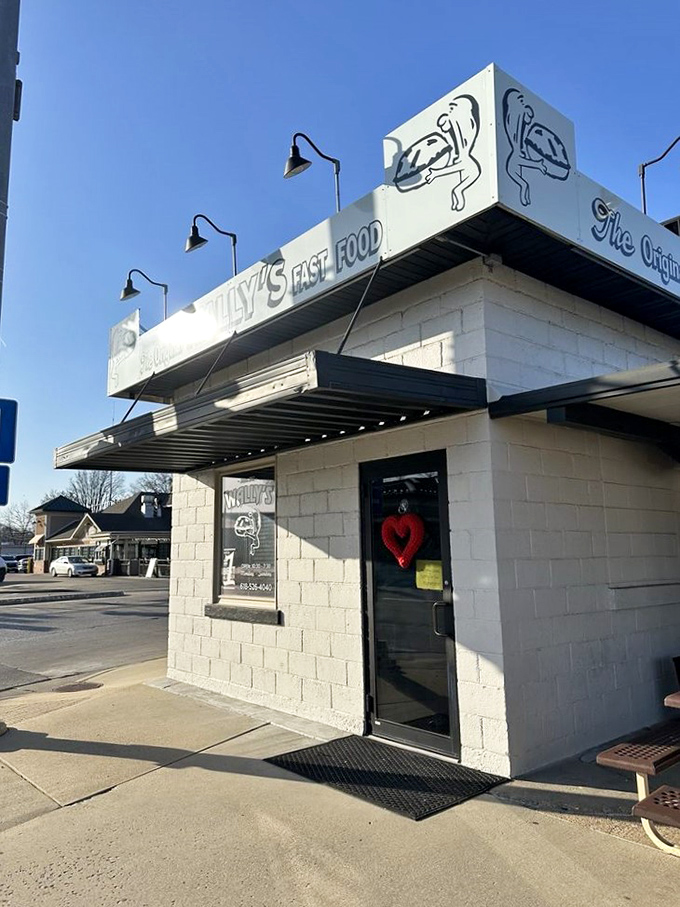Step back in time! Wally's Drive-In looks like it was plucked straight out of a 1950s postcard, complete with retro signage and classic charm.