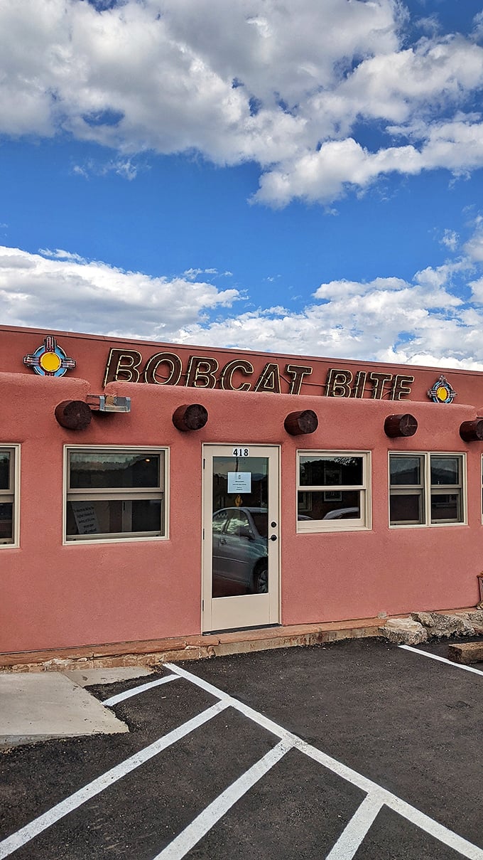 Pink adobe charm meets burger paradise! This unassuming exterior hides a world of flavor waiting to be discovered.