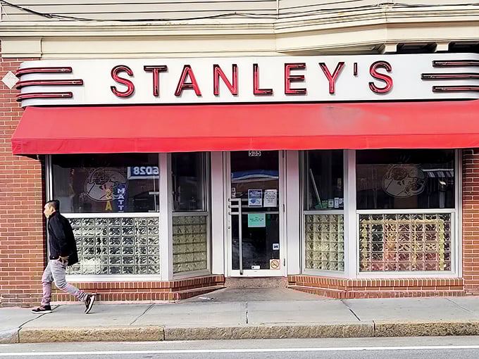 Step back in time! Stanley's iconic red awning and retro signage beckon you to a burger paradise that's been flipping patties since 1932.