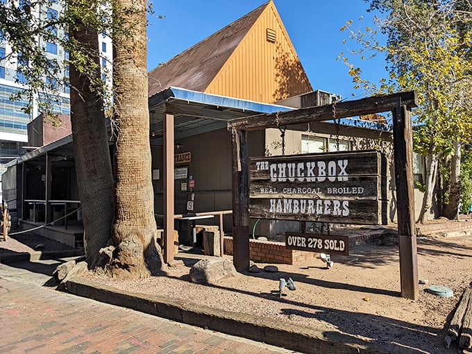 Rustic charm meets urban oasis! The Chuckbox's exterior is like a time machine disguised as a burger joint.