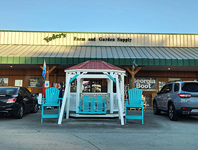 The unassuming exterior of Yoder's Dutch Pantry, where that blue gazebo practically whispers, "Sit a spell after you've consumed your weight in cinnamon rolls."