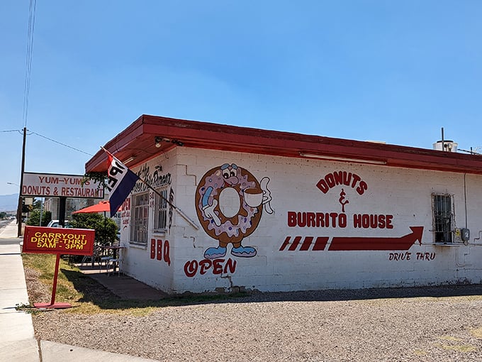 Welcome to Yum-Yum's, where the neon "OPEN" sign might as well say "Abandon all diets, ye who enter here!" This unassuming exterior hides a treasure trove of deliciousness.