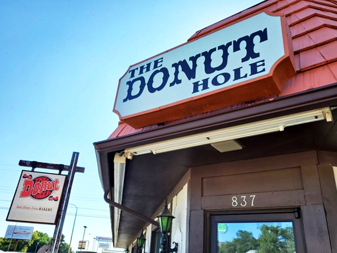 A sign that promises sweet salvation! The Donut Hole's exterior is like a beacon of sugary hope in Dickinson's landscape.