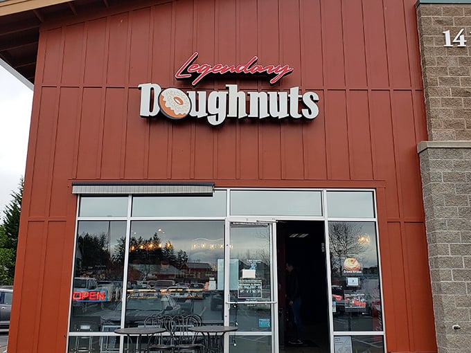 Welcome to donut paradise! Legendary Doughnuts' rustic red exterior promises sweet adventures within, like Willy Wonka's factory for grown-ups.