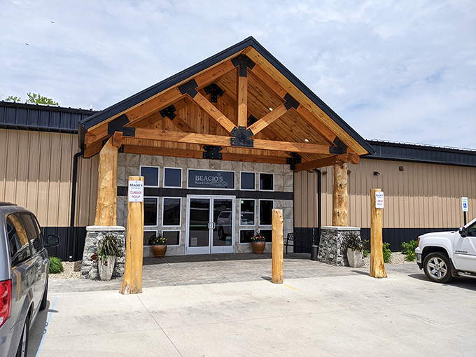 Rustic charm meets pizza paradise! Beagio's exterior beckons with its log cabin-inspired facade, promising a cozy retreat for carb enthusiasts and cheese aficionados alike.