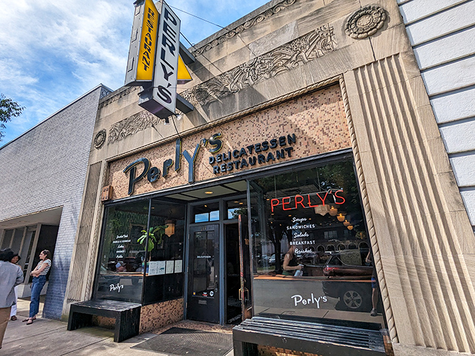 Perly's vintage storefront promises time travel via sandwich &ndash; the yellow sign beckons like a delicious lighthouse for the famished and fancy-free.