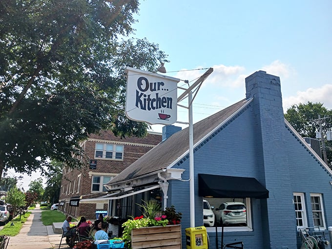 A blue beacon of breakfast bliss! Our Kitchen's charming exterior promises comfort food that'll make your taste buds do the happy dance.