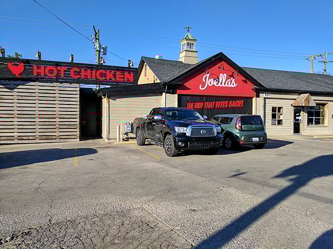 Welcome to flavor town! Joella's exterior promises a spicy adventure with its bold red facade and cheeky slogan.