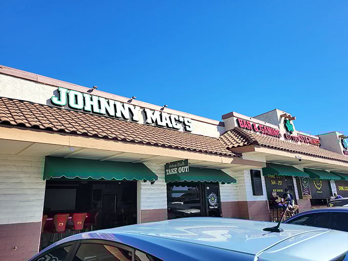 Johnny Mac's: Where sports dreams and buffalo wings collide! This unassuming exterior hides a flavor paradise waiting to be discovered.