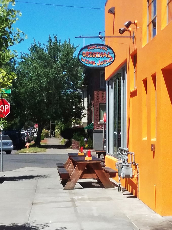 Welcome to wing paradise! Fire on the Mountain's vibrant orange exterior is like a beacon calling all flavor seekers to its doorstep.