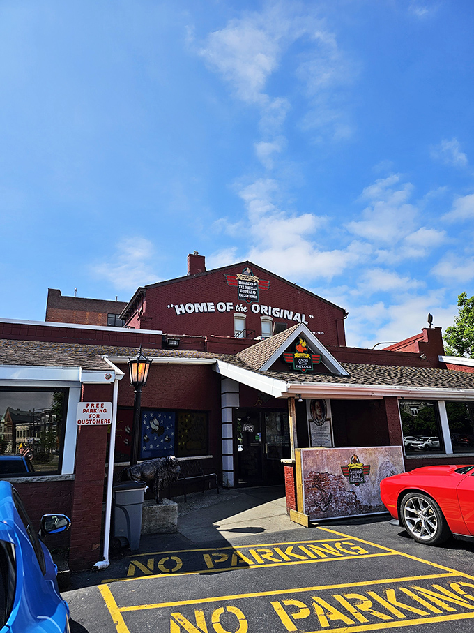 The unassuming red brick exterior of Anchor Bar proudly declares itself "Home of the Origin" &ndash; where culinary history was made one fateful night in 1964.