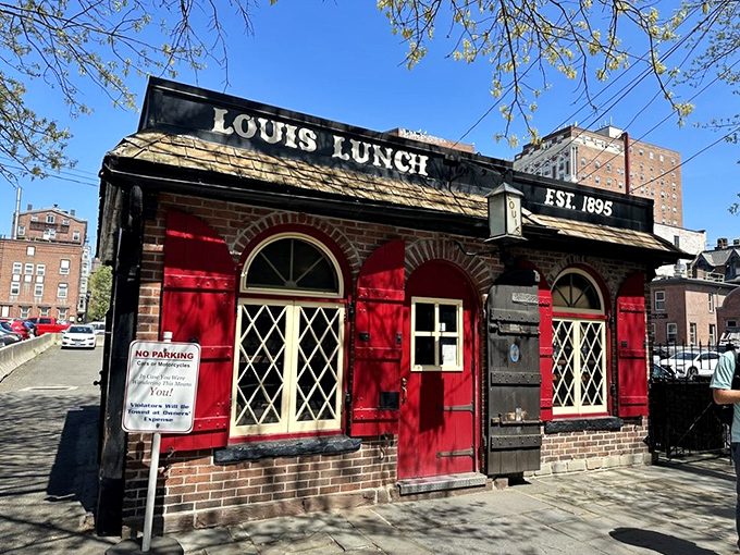 A little red brick building with a big burger legacy. Louis' Lunch stands proud, serving up history and flavor since 1895.