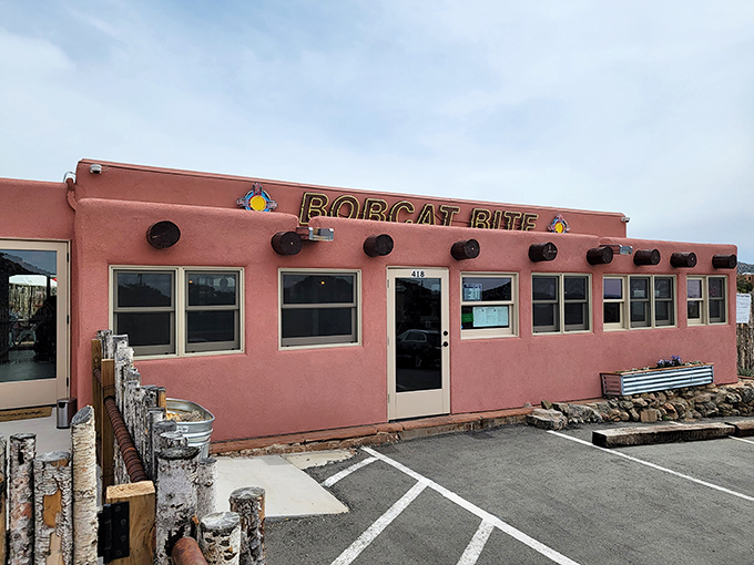 Pink adobe charm meets burger paradise! This unassuming exterior hides a world of flavor waiting to be discovered.