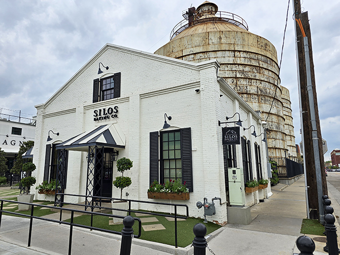A slice of heaven wrapped in white brick! Silos Baking Co. stands like a beacon of sweetness, beckoning sugar-lovers with its charming facade and promise of delectable treats.
