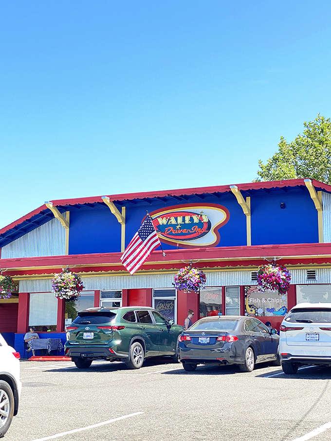 A slice of Americana, served with a side of nostalgia! Wally's Drive-In stands proud, its red, white, and blue facade a beacon for burger lovers everywhere.