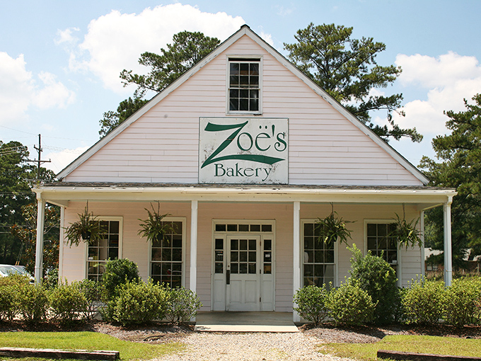 Welcome to Zoe's Bakery, where Southern charm meets pastry perfection! This quaint cottage could easily double as a movie set for "Steel Magnolias: The Bakery Edition."