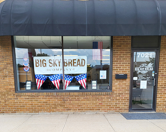 Stars and stripes forever! This patriotic storefront isn't just waving flags&mdash;it's wafting the irresistible aroma of freshly baked bread across Urbandale.