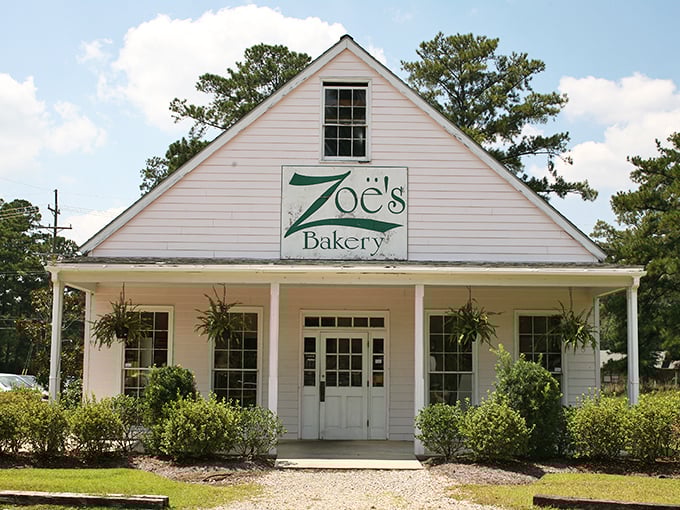 Welcome to Zoe's Bakery, where Southern charm meets pastry perfection! This quaint cottage could easily double as a movie set for "Steel Magnolias: The Bakery Edition."