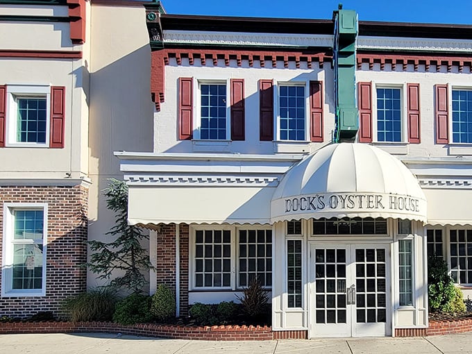 A seafood lover's dream come true! Dock's Oyster House stands proud, its white awning beckoning like a siren's call to hungry sailors and landlubbers alike.