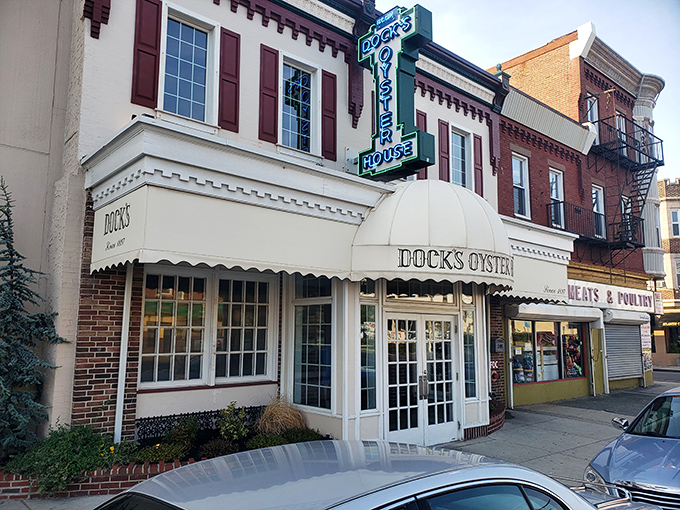 A seafood lover's dream come true! Dock's Oyster House stands proud, its white awning beckoning like a siren's call to hungry sailors and landlubbers alike.