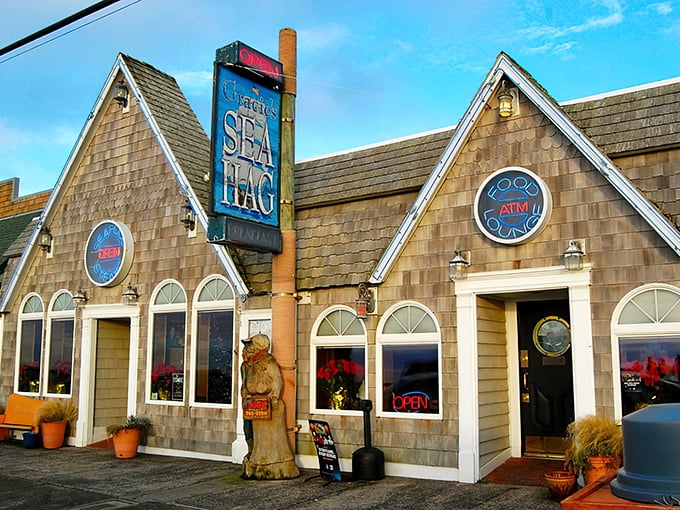 Ahoy, seafood lovers! Gracie's Sea Hag beckons with its charming cedar-shingled exterior, promising a nautical adventure for your taste buds. It's like a cozy beach cottage grew up and became a culinary hotspot!