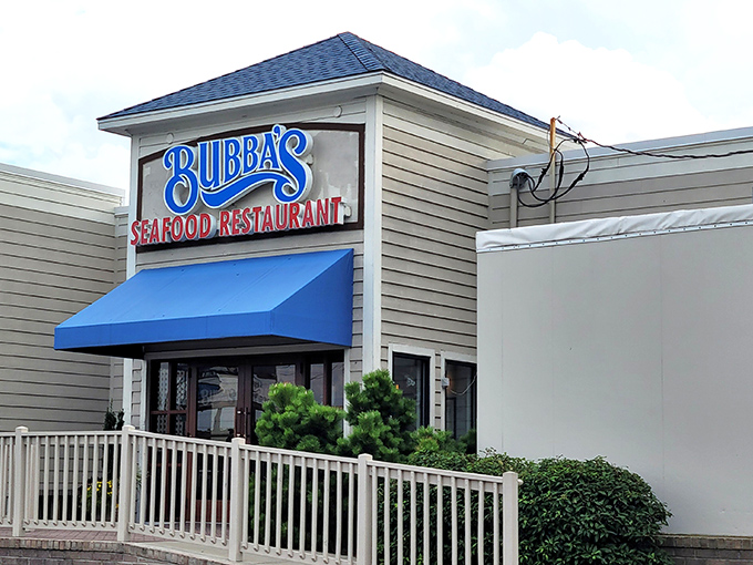 Bubba's beckons with its bright blue awning, like a siren call for seafood lovers. This unassuming exterior hides a treasure trove of oceanic delights within. 