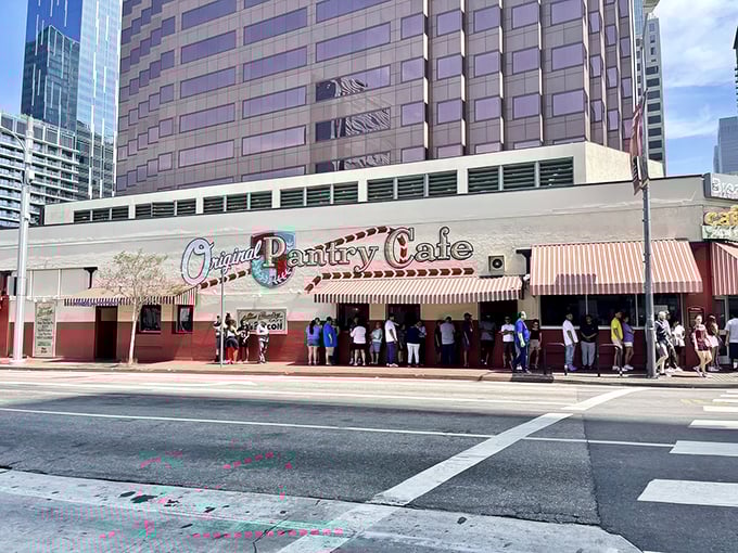 The iconic red and white exterior stands like a time capsule amid downtown LA's skyscrapers&mdash;a defiant reminder that some traditions are worth preserving.