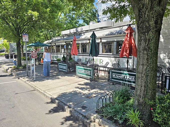 The iconic Summit Diner stands proudly on the street corner, its vintage sign a beacon to breakfast lovers seeking authentic New Jersey cuisine.