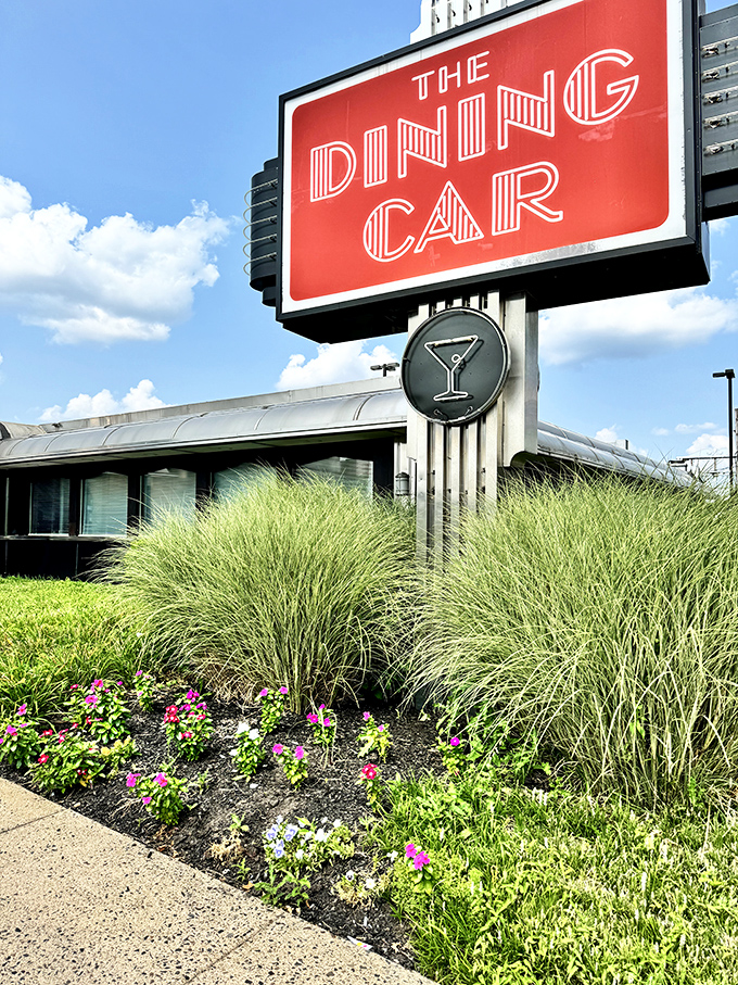 The gleaming Art Deco exterior of The Dining Car stands as a shining beacon of classic Americana, promising comfort food and nostalgia in equal measure.