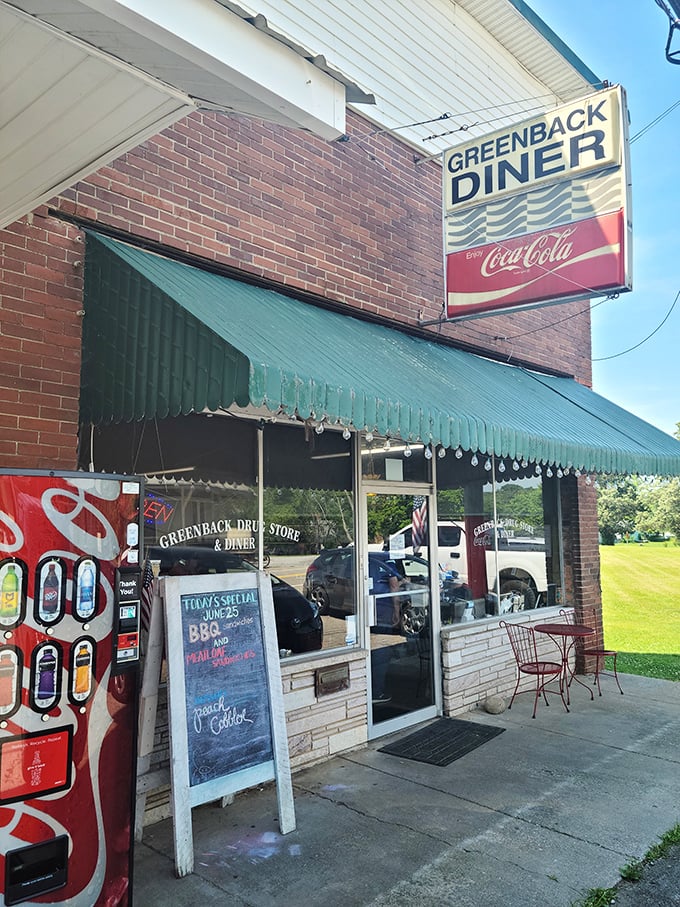 The classic brick exterior with its vintage Coca-Cola sign and green awning isn't trying to be retro-cool&mdash;it's the real deal, standing proudly since 1933.