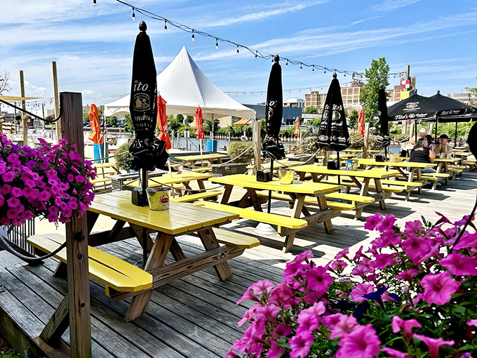 Sun-soaked paradise or Milwaukee hotspot? At Twisted Fisherman, you'll swear you've stumbled onto a secret coastal getaway, complete with cheerful yellow tables and string lights.