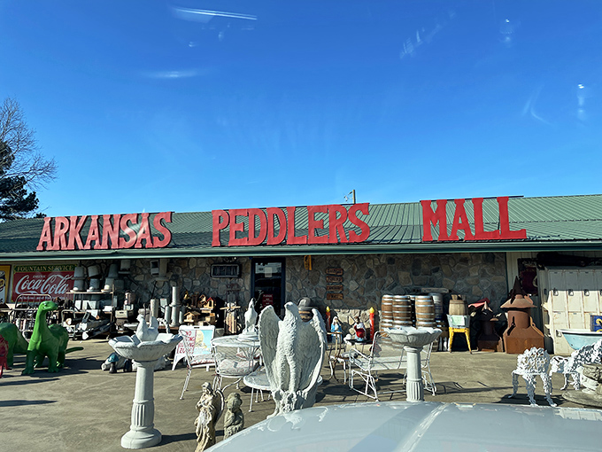 Welcome to the time machine! Arkansas Peddlers Antique Mall's exterior promises a journey through decades, with treasures spilling out onto the sidewalk.