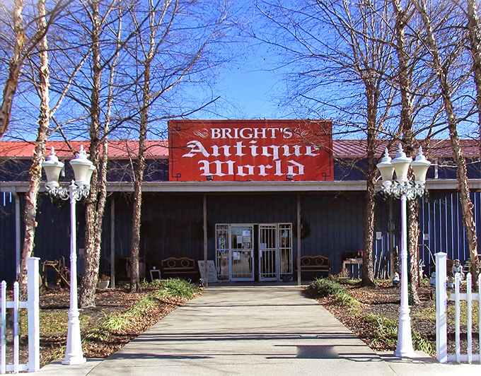 A blue oasis of nostalgia beckons! Bright's Antique World stands tall, its vintage Gulf sign a beacon for treasure hunters and time travelers alike.