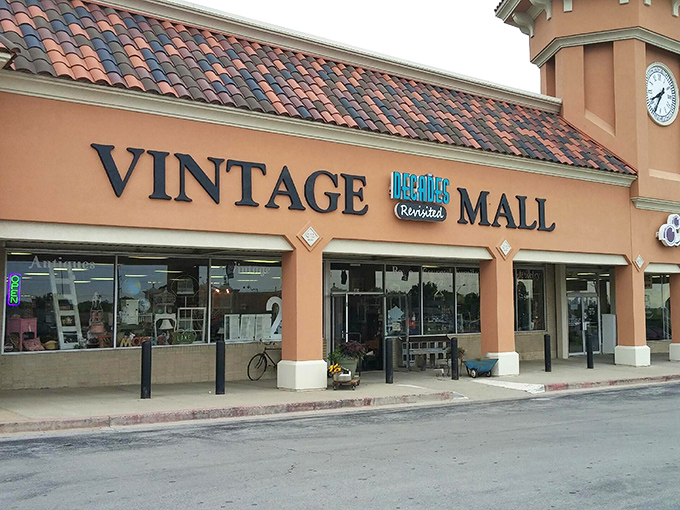 Welcome to the time machine! Decades Revisited's exterior promises a journey through the ages, with its Spanish-style roof and clock tower standing sentinel over vintage treasures.
