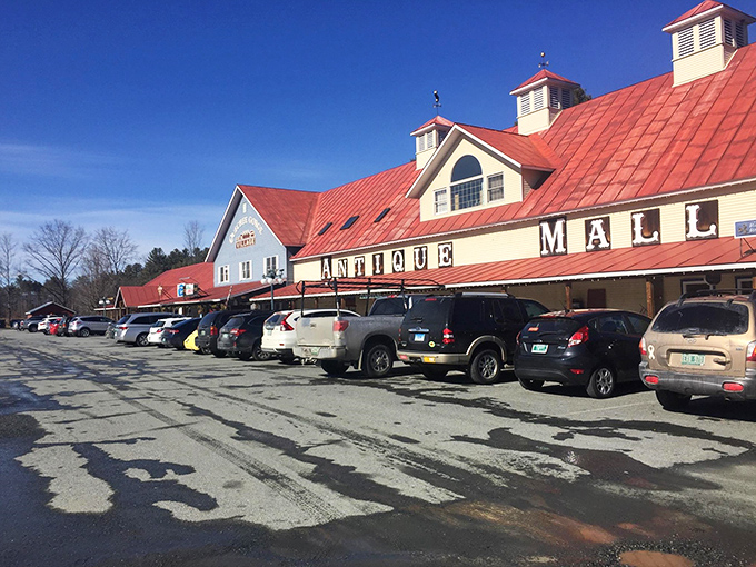 The iconic exterior of Vermont Antique Mall stands like a beacon of nostalgia against the Green Mountain backdrop, welcoming treasure hunters from near and far.