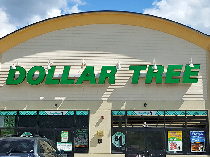 The Salem Dollar Tree stands like a budget-friendly beacon under New Hampshire's blue skies, promising affordable treasures within its unassuming yellow exterior.
