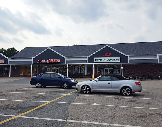 The unassuming facade of Family Dollar in Coventry stands ready to welcome bargain hunters under that classic New England blue sky.