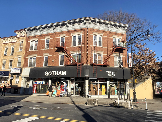 A brick-and-mortar time machine! Gotham Thrift Shop's classic facade promises adventures in vintage treasures, with a side of street art flair.