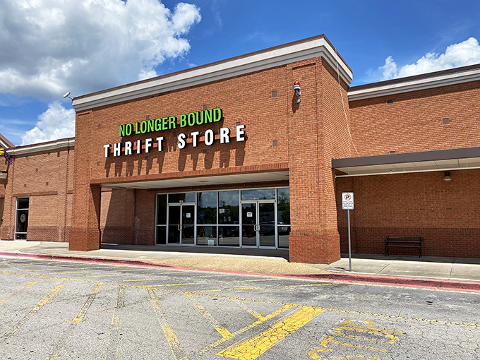 The iconic brick facade welcomes bargain hunters with its bright green signage, a beacon for treasure seekers in the North Georgia hills.