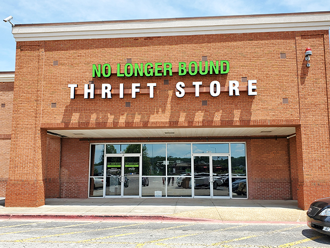 The iconic brick facade welcomes bargain hunters with its bright green signage, a beacon for treasure seekers in the North Georgia hills.