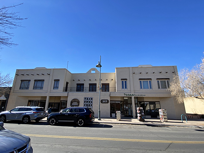 A bookworm's oasis in the desert! COAS Books stands proud against the New Mexico sky, promising literary adventures within its adobe walls.