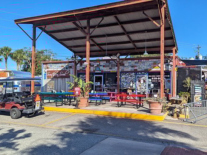 Welcome to barbecue paradise! Southern Soul's exterior is a rustic symphony of weathered wood, license plates, and the promise of smoky delights.