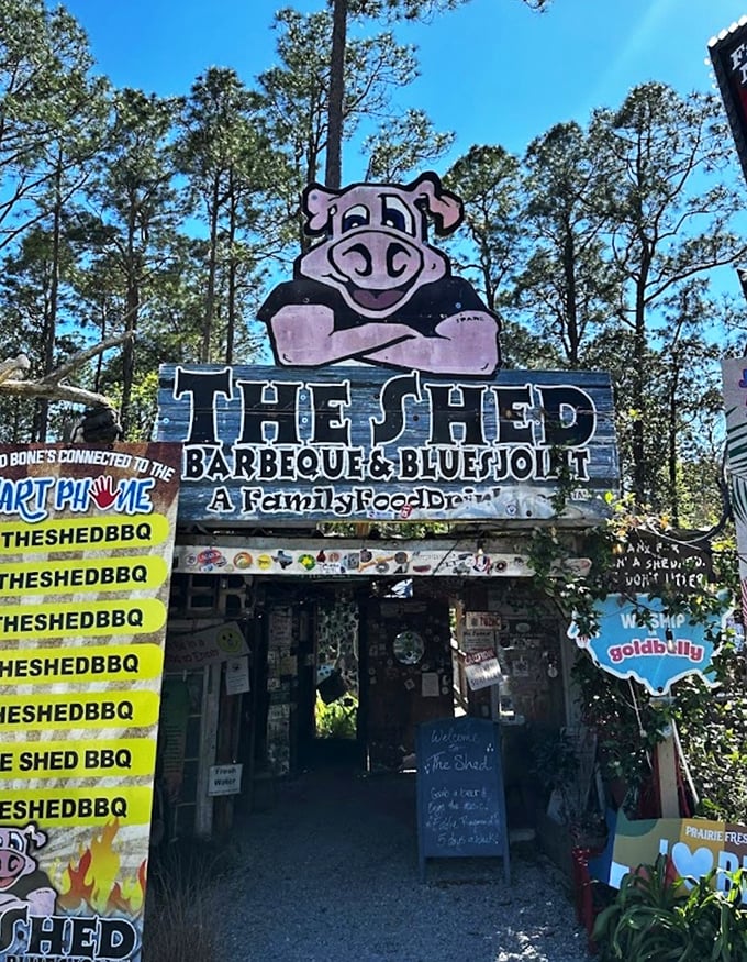 Welcome to barbecue paradise! The Shed's exterior is a delightful hodgepodge of rustic charm and quirky personality, like your eccentric uncle's dream treehouse come to life.