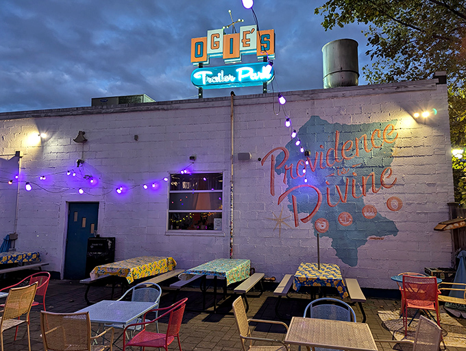Neon dreams and trailer park schemes! Ogie's exterior glows with retro charm, inviting you into a world where kitsch is king and nostalgia reigns supreme.