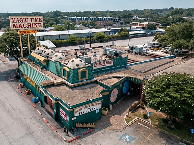 Welcome to the Magic Time Machine! This whimsical exterior looks like a cross between a medieval castle and a retro spaceship. Buckle up, time travelers!