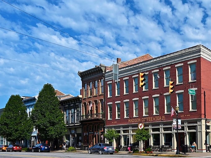 Madison's golden-hour glow transforms the Ohio River into a ribbon of light, while the historic downtown waits patiently below like a living museum. 
