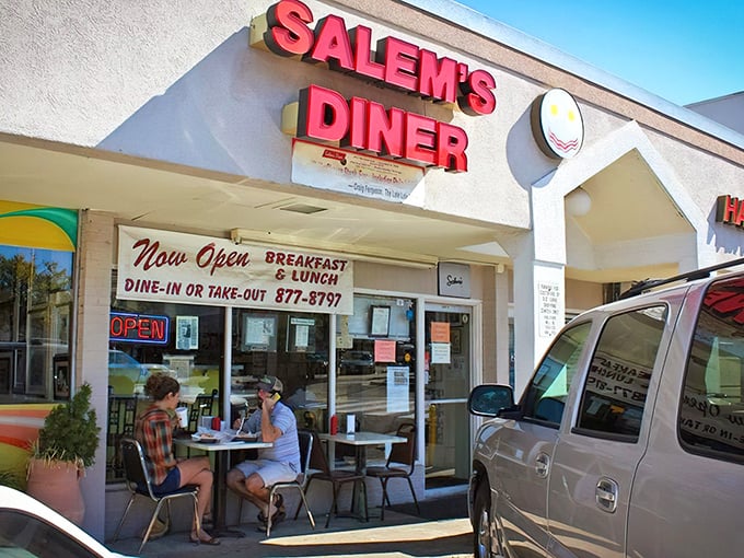 Welcome to Salem's Diner, where the red sign shines like a beacon for breakfast lovers. This unassuming storefront holds more flavor than your grandma's recipe box!